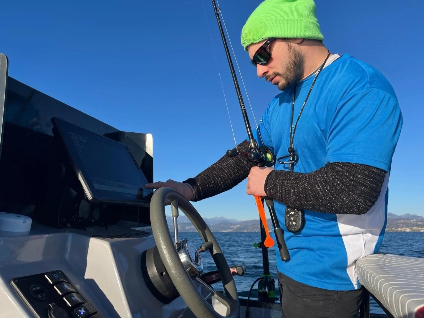 Fishing from a speedboat on Lake Garda with an experienced guide ...
